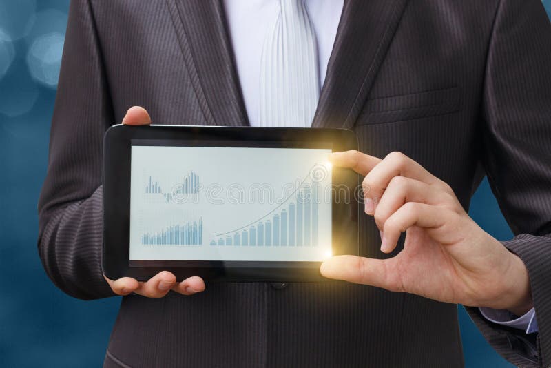 Business Man Showing a Growth Chart . Stock Photo - Image of control ...