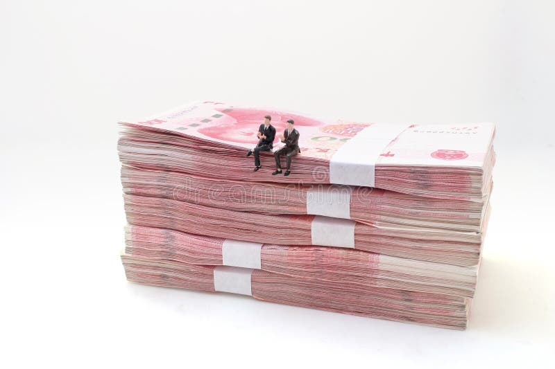 The Business Man Sit on Stacks of Chinese Yuan Banknotes Stock Image ...