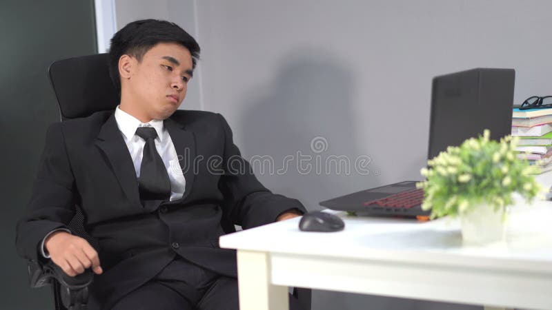 Man Sitting on the Chair Thinking Deeply Stock Photo - Image of sitting ...