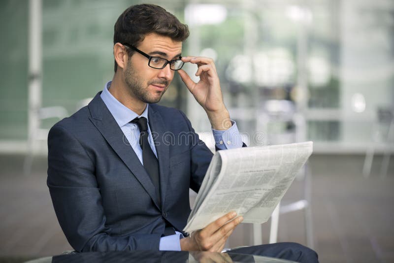 6,304 Man Looking Newspaper Stock Photos - Free & Royalty-Free Stock ...