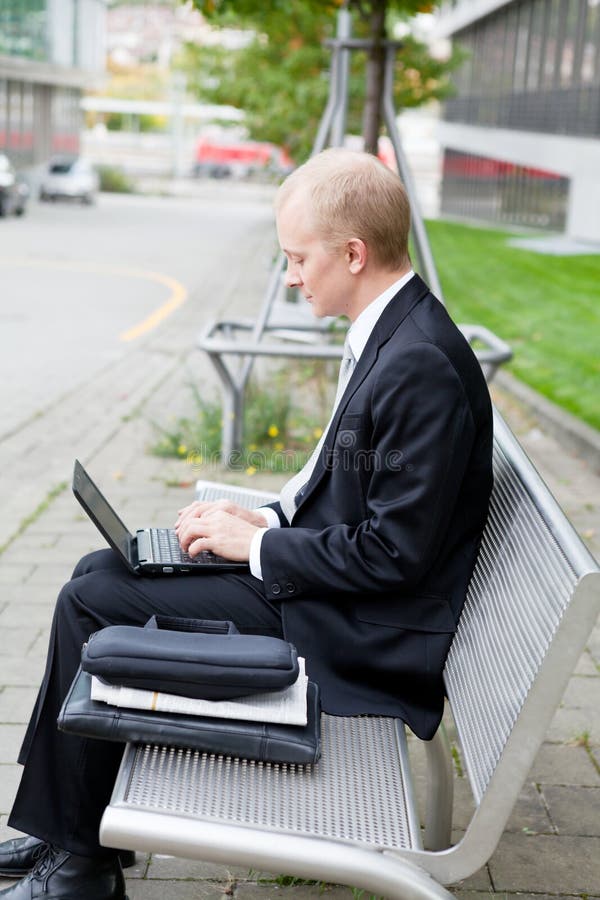 Business Man Sitting Outdoor Working with Notebook Stock Image - Image ...
