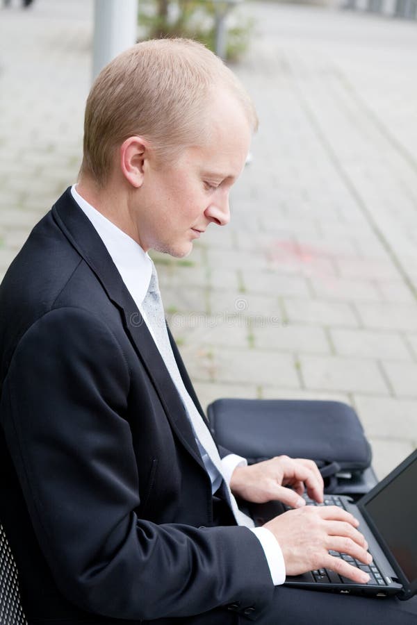 Business Man Sitting Outdoor Working with Notebook Stock Image - Image ...