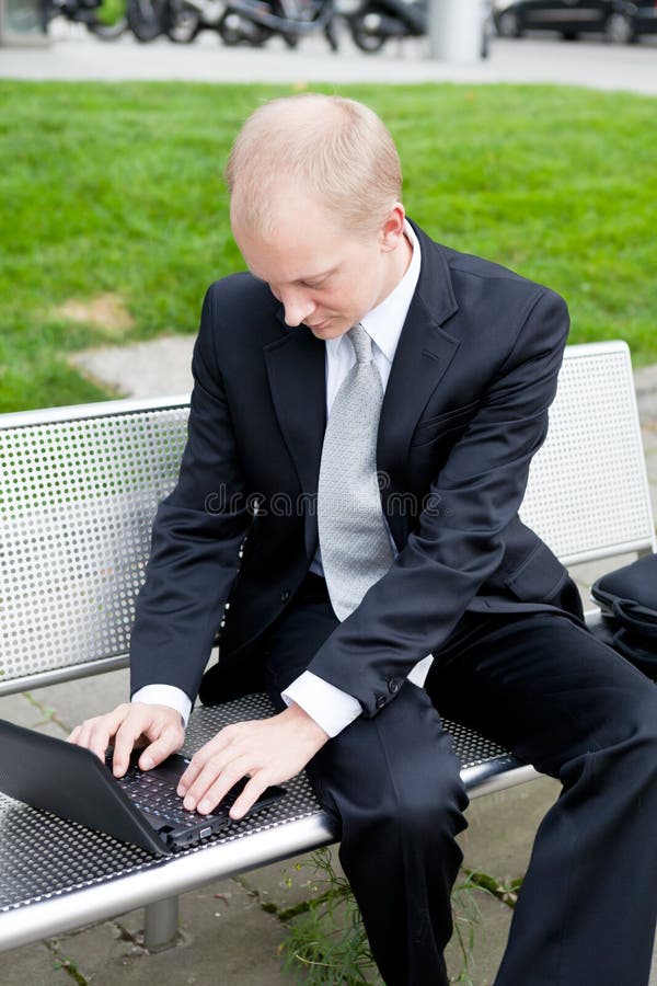 Business Man Sitting Outdoor Working with Notebook Stock Image - Image ...