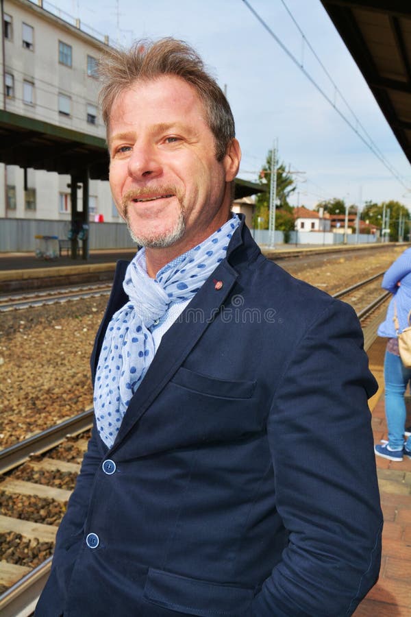 Business Man Smiling in a Train Station Stock Image - Image of italy ...