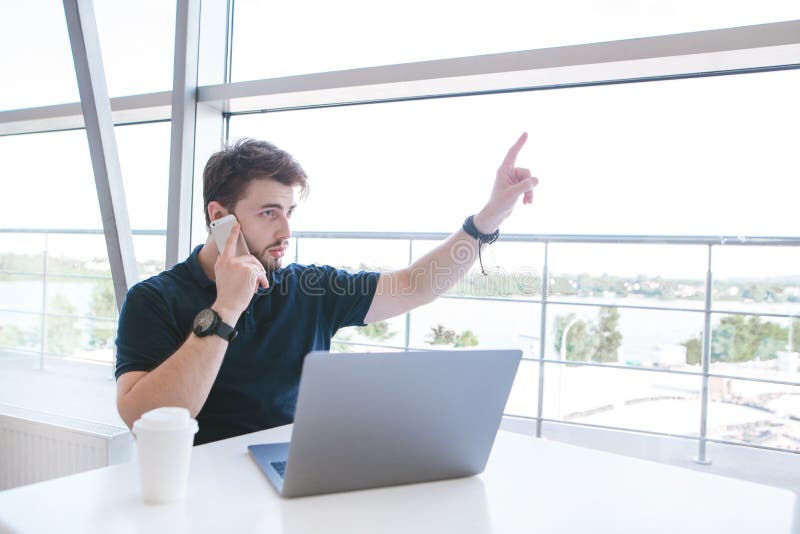 Business Man Solves Problems Over the Phone during a Break Stock Image ...