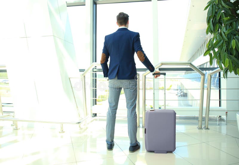 Business Man with Suitcase in Hall of Airport. Stock Image - Image of ...