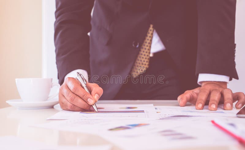 Business Man Taking Note on Financial Report Stock Image - Image of ...