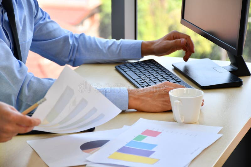 Business Man and Woman Shaking Hands while Standing with Colleagues ...