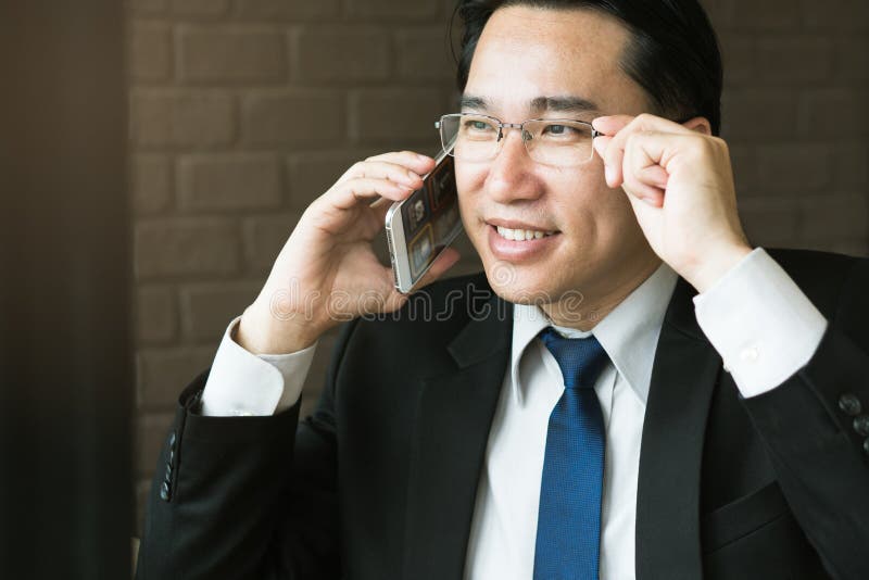 The Business Man Talking To Smart Phone. Stock Photo - Image of ...