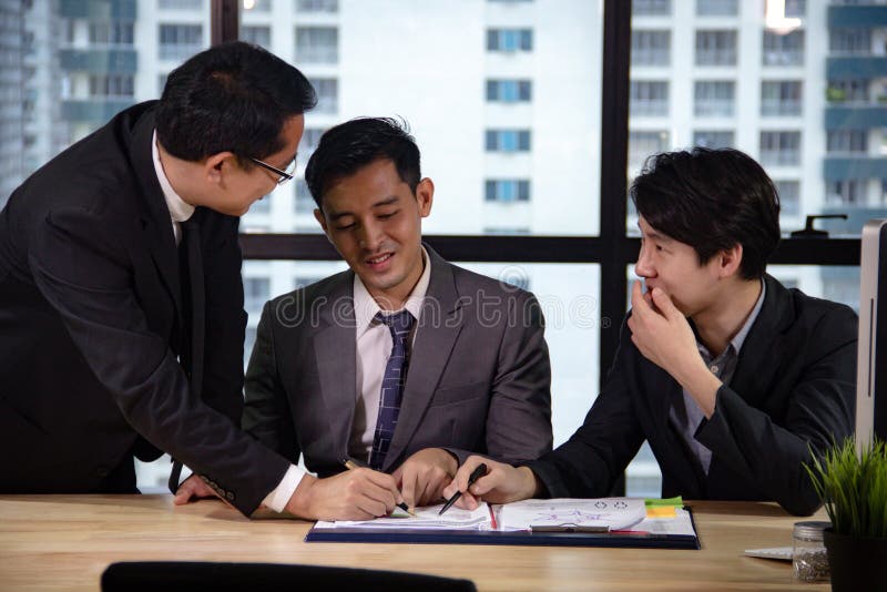 Business Man Teamwork Meeting and Discuss at Desk in the Office. Stock ...
