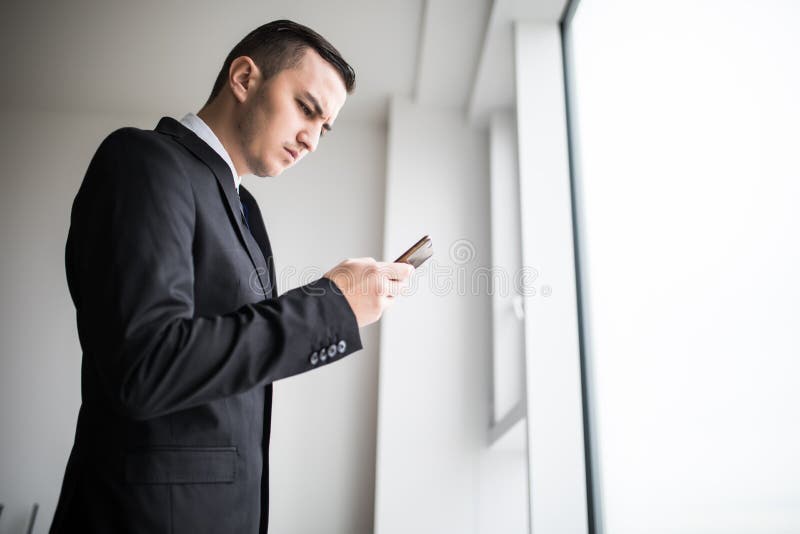 Business Man Texting at Work Stock Photo - Image of glasses, inside ...