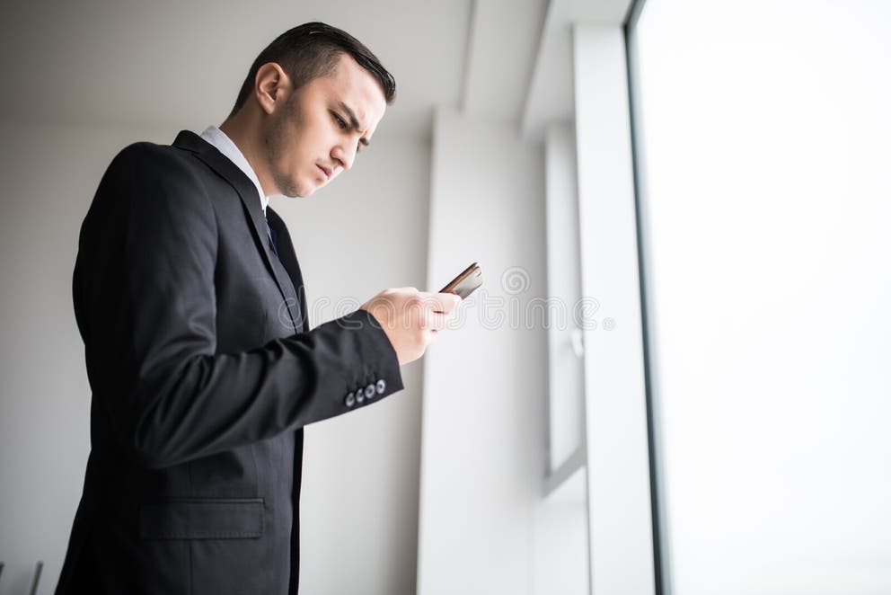 Business Man Texting at Work Stock Photo - Image of glasses, inside ...