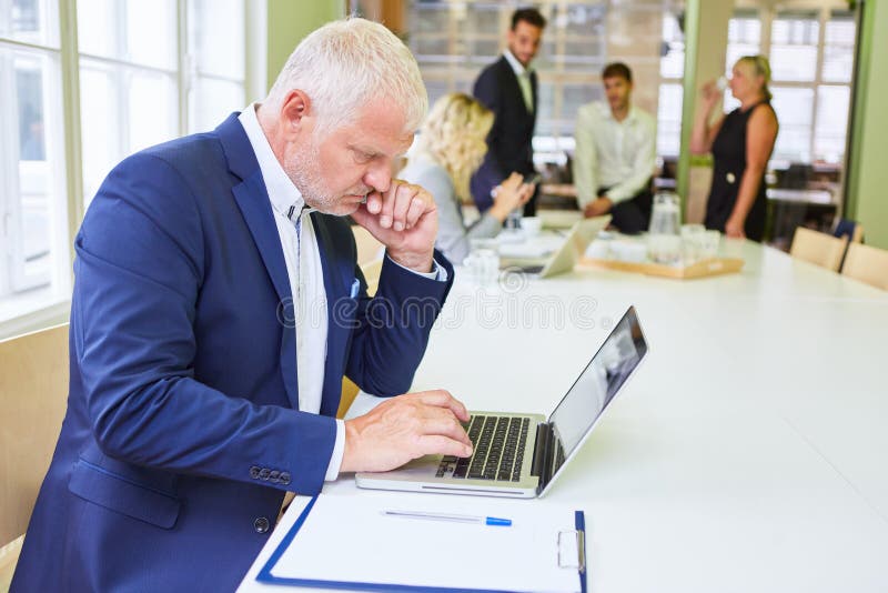 Business Man Thinking about a Problem on Laptop Stock Photo - Image of ...
