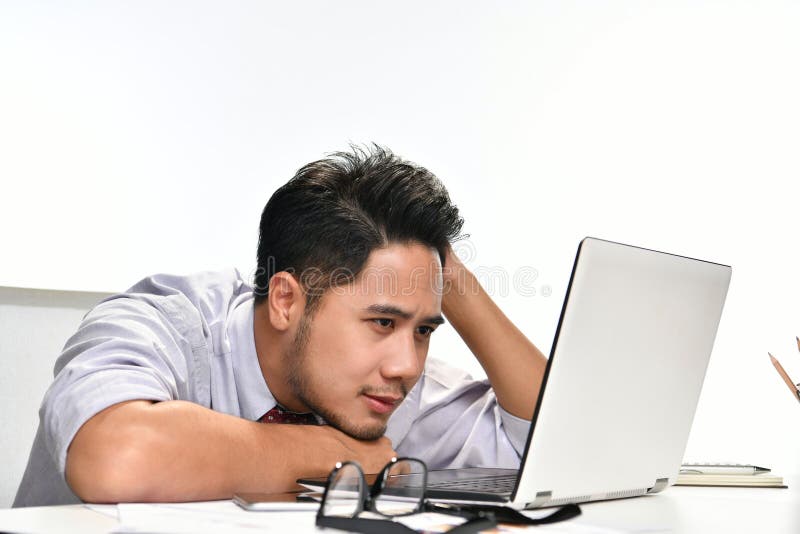 Business Man Thinking while Working with Laptop Computer Stock Photo ...