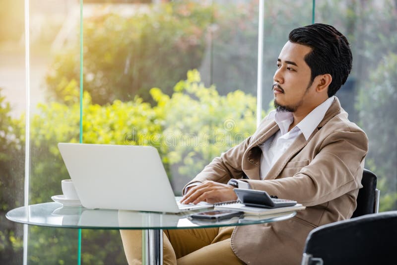 Business Man Thinking and Working with Laptop Computer Stock Photo ...