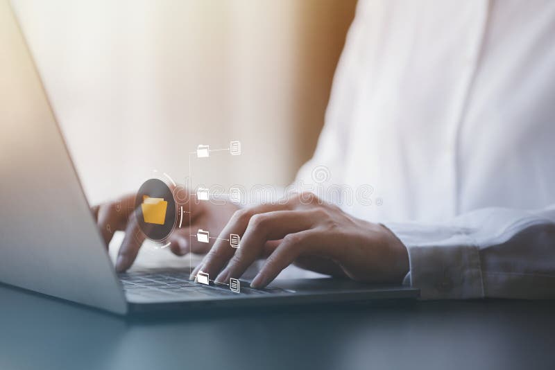 Business Man Typing on a Keyboard with Holograms of Digital Document ...