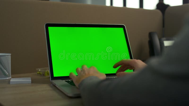 Business Man Typing Laptop Computer Green Screen in Office. Man Using ...
