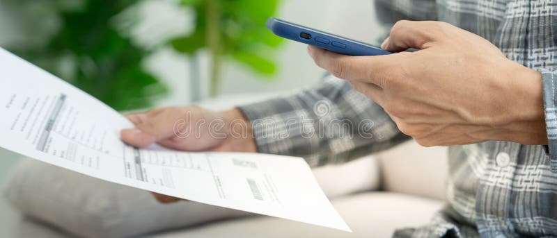 Business Man Use Phone To Scan Barcode or QR Codes To Pay Credit Card ... Business Man Use Phone To Scan Barcode or QR Codes To Pay Credit Card ...
