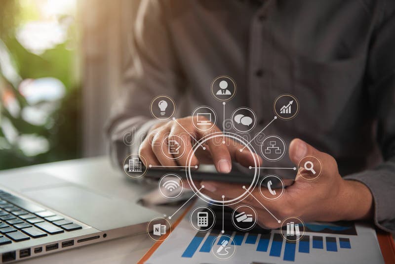 Business Data, Busy Working on Laptop Computer with Smart Phone and ...