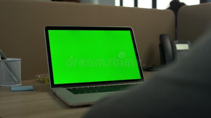 Business Man Using Green Screen Laptop Computer in Office. Green Screen ...
