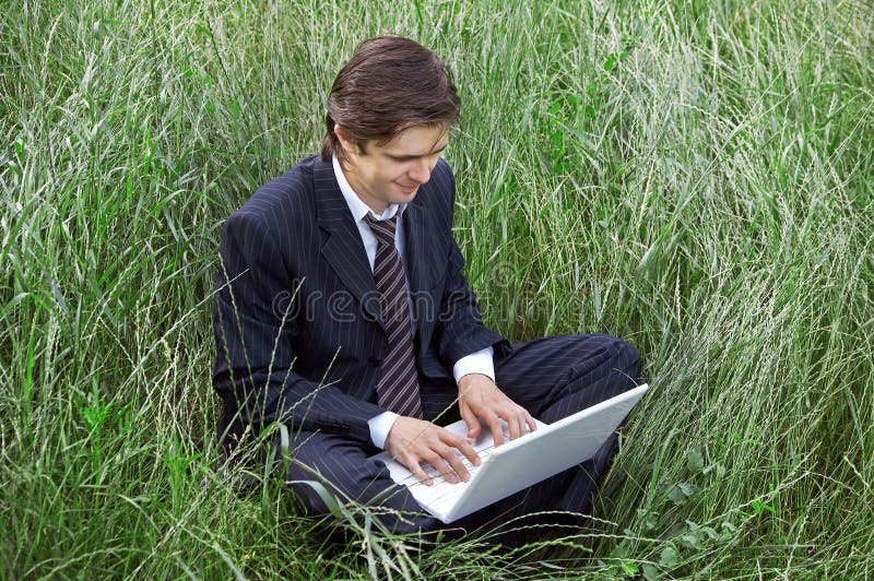 Happy Man with Computer in the Field Stock Image - Image of laptop ...
