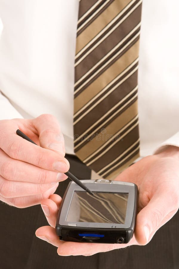 Business man using a pda stock photo. Image of elegant - 7315924
