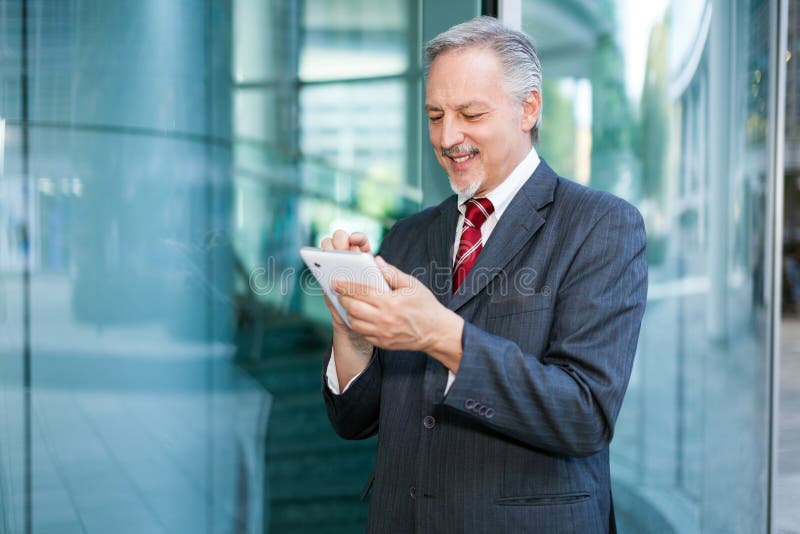 Business Man Using a Tablet Stock Photo - Image of person ...
