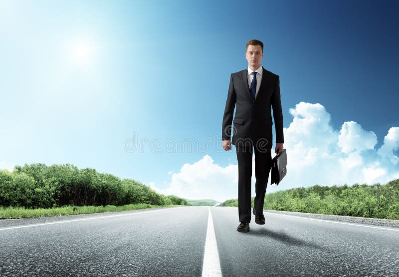 Young Businessman in Front of a Crossroad Stock Image - Image of ...