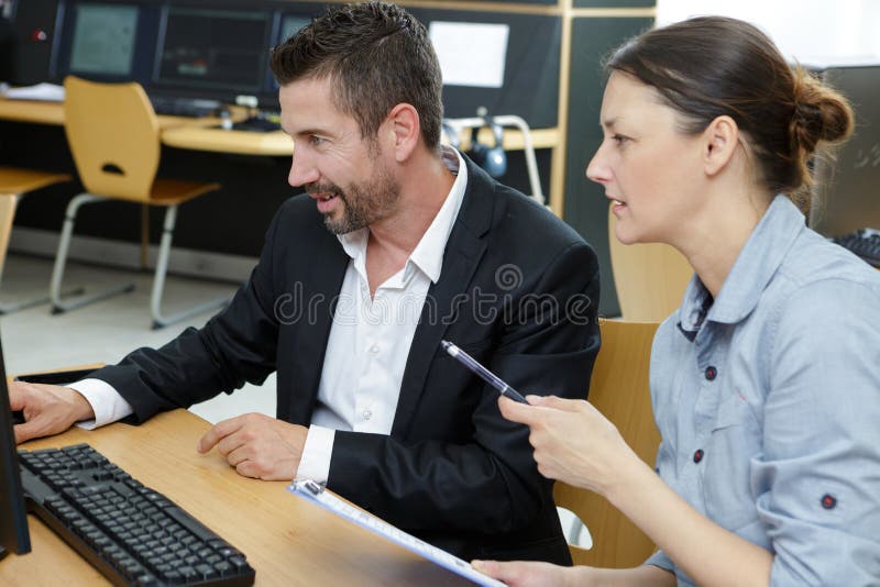 Business Man and Woman on Computers Stock Photo - Image of access ...