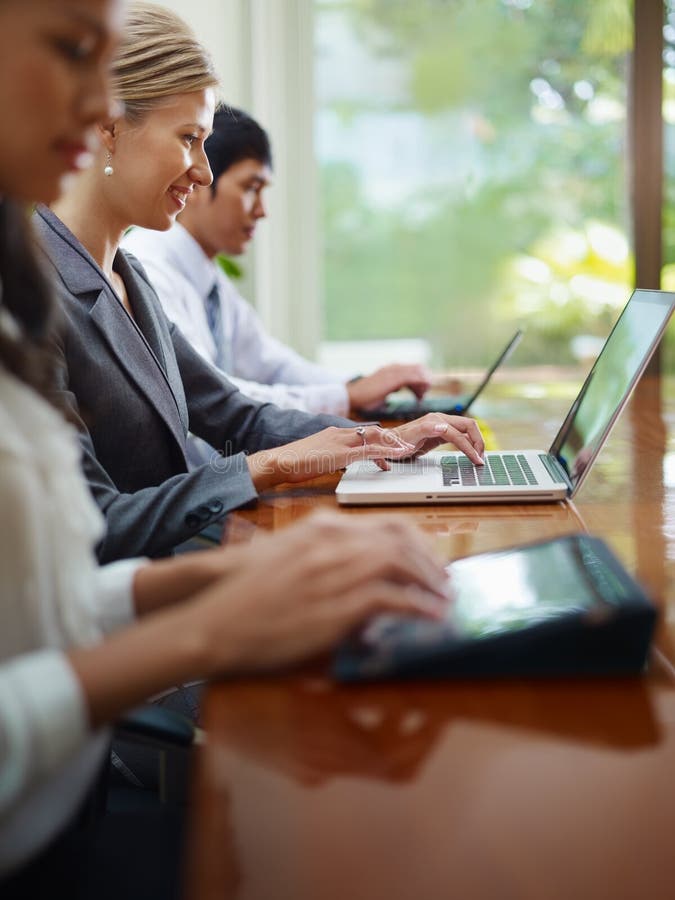 Business Man and Women Typing on Pc during Meeting Stock Photo - Image ...