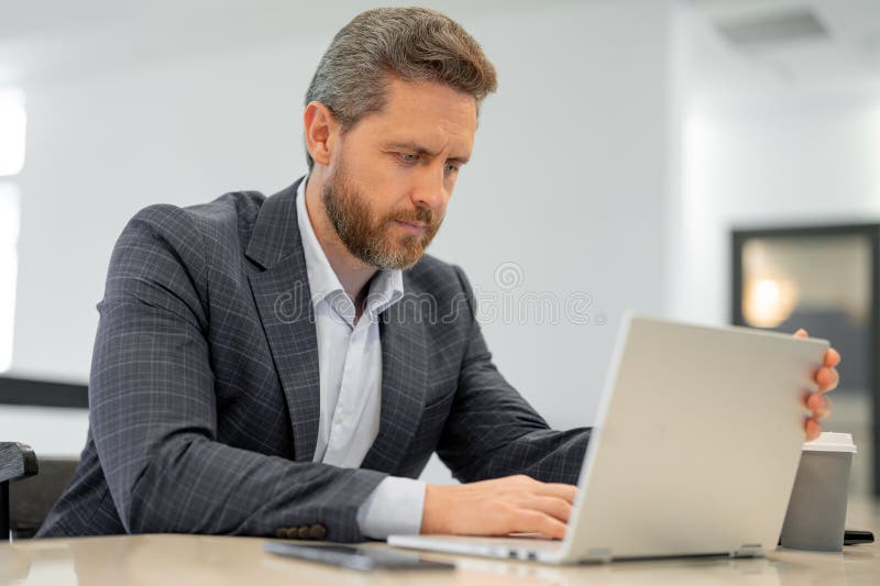 Business Man Work with Laptop at Office. Business Man in Suit in Office ...
