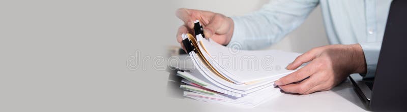 Man Working Computer and Stack of Documents Stock Image - Image of ...