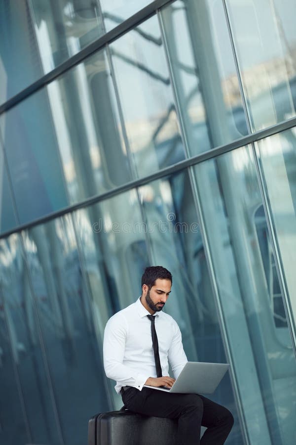 Business Man Working on Computer Traveling at Airport Stock Photo ...
