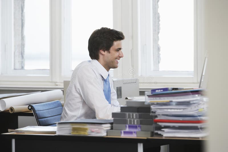 Business Man Working At Desk In Office Smiling Stock Image - Image of ...