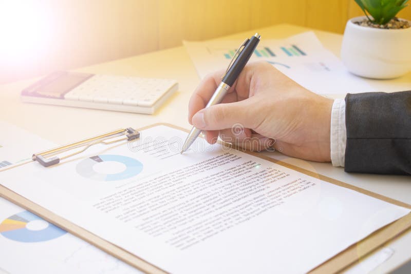 Business Man Working with Financial Data - Pen in Hand Stock Image ...