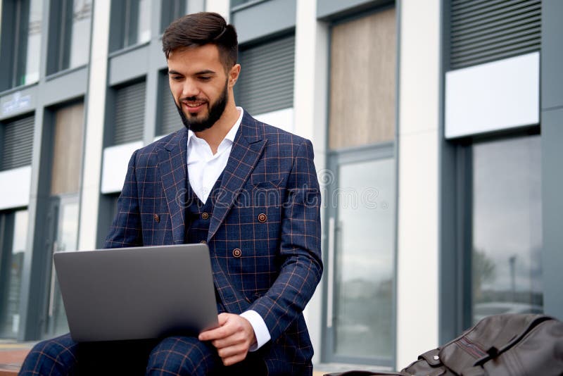 Business Man Working on Laptop Computer. Man in Business Suit on ...
