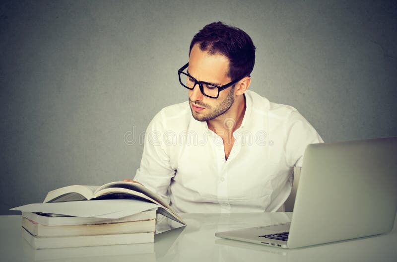 Business Man Working with Laptop Reading Books Stock Image - Image of ...