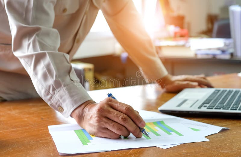 Business,Man Working Office are Analyzing Graph Data. Stock Image ... Business,Man Working Office are Analyzing Graph Data. Stock Image ...