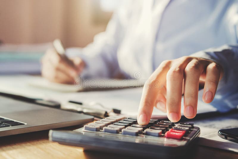 Business Man Working in Office and Using Calculator Stock Photo - Image ... Business Man Working in Office and Using Calculator Stock Photo - Image ...
