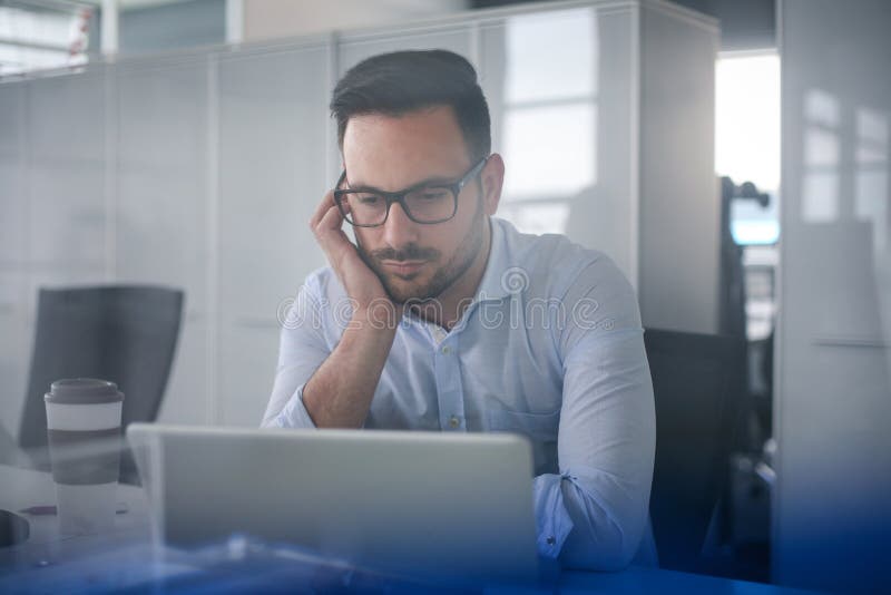 Business Man Working in Office. Business Man Using Laptop Stock Image ...