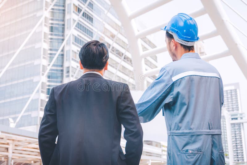 Business Manager and Engineer Meeting Project at Construction Si Stock ...