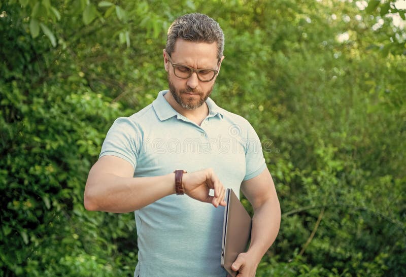 Business Manager Freelancing and Checking Time Outdoor. Business ...