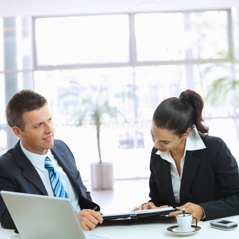 Businessman with Co-workers Text Messaging on Cell Stock Photo - Image ...