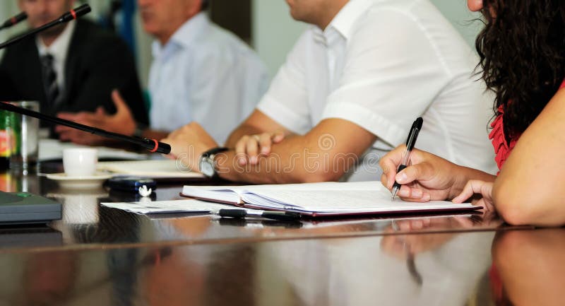 Business People Taking Notes in a Meeting Stock Image - Image of hand ...