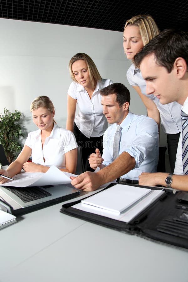 Young Business People Taking Notes at a Conference Stock Photo - Image ...