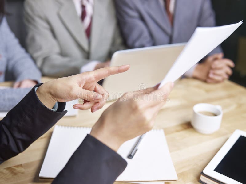 Four Business People in a Boardroom Stock Photo - Image of meeting ...