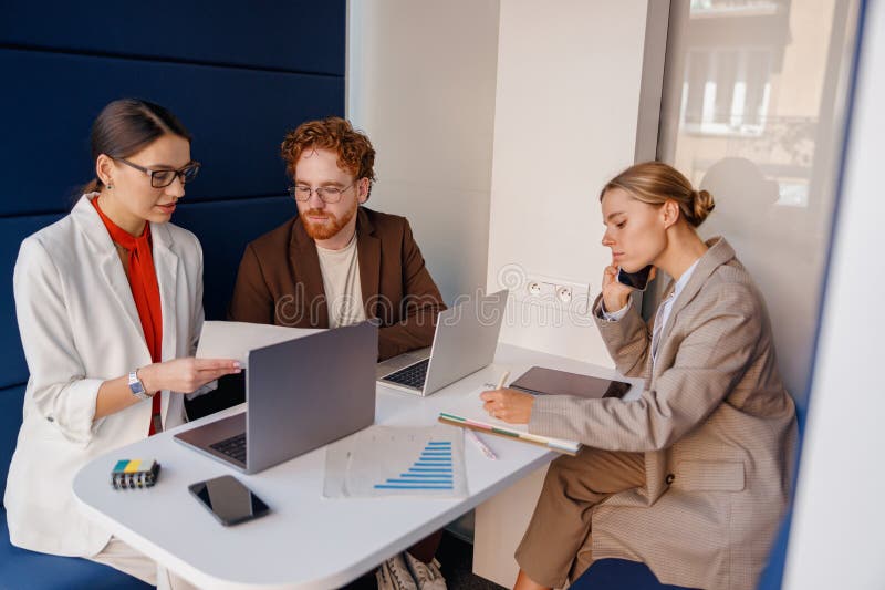 A Business Meeting with a Collaborative Team in a Modern and Inviting ...