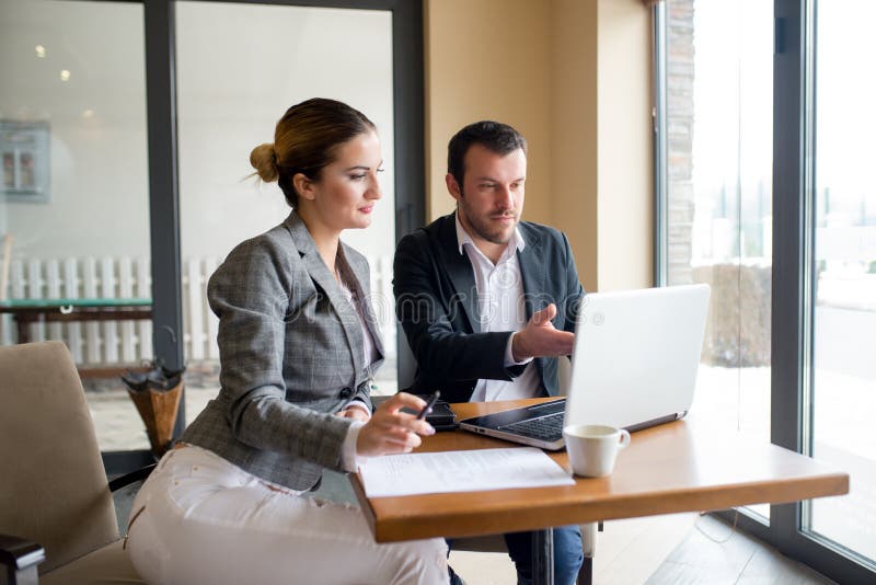 Man is Explaining Something on Computer To His Partner Stock Image ...