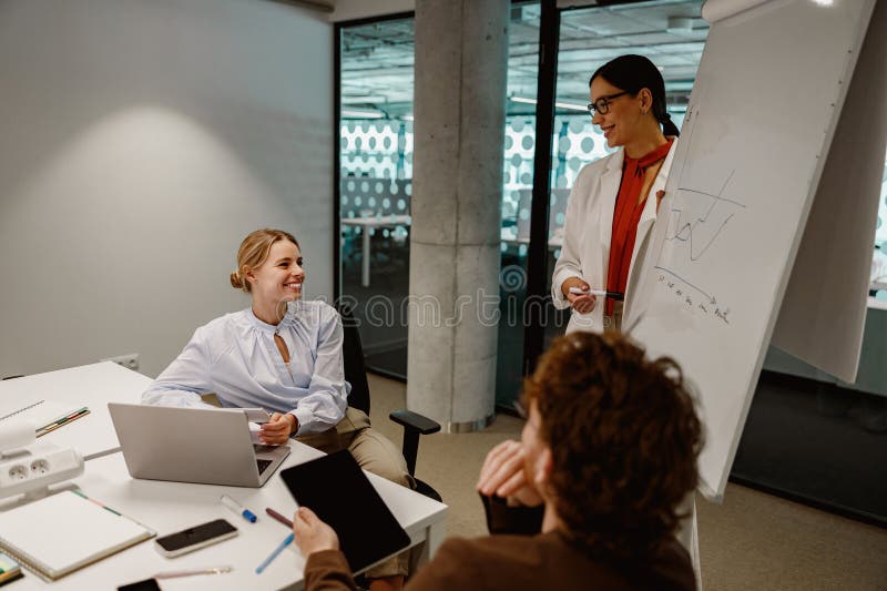 A Business Meeting Featuring an Extensive Presentation Conducted in a ...