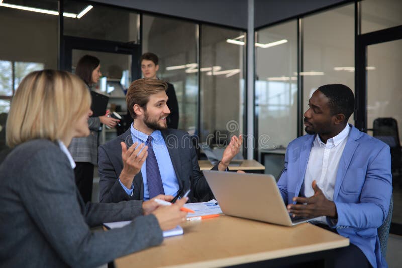 Business Meeting - Manager Discussing Work with His Colleagues. Stock ...